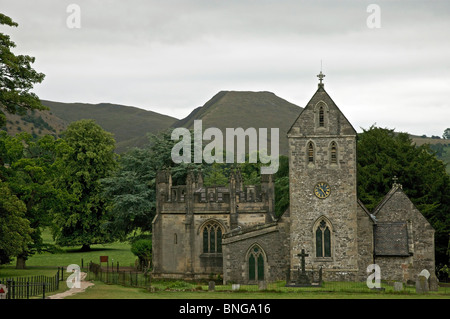 Ilam Park in the Peak District with the flat top of Thorpe Cloud in the ...
