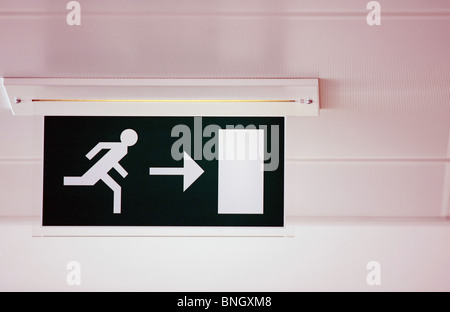 Emergency Exit sign ceiling hanging Stock Photo - Alamy