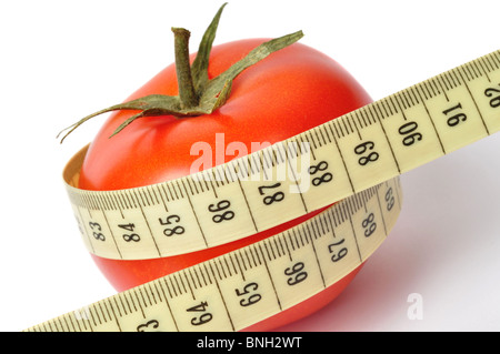 Diet concept. Measuring tape on wooden background with book diary ...
