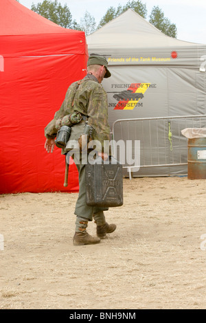 WWII war games German soldier firing pistol Stock Photo - Alamy