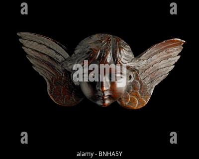 Carved wooden angel's head and wings on the seventeenth-century ...