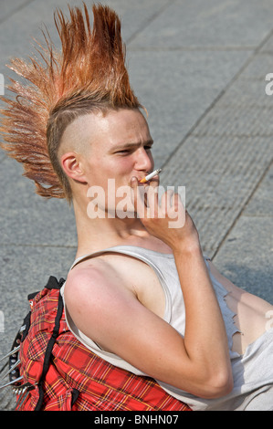 Young punk rocker smoking cigarette Stock Photo - Alamy