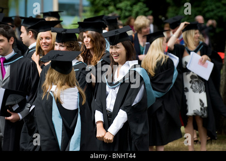 Graduation ceremony at the University of Birmingham A student uses a ...
