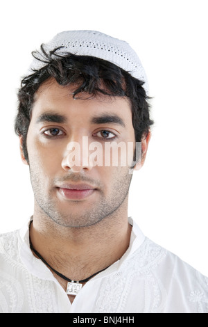 Portrait of Muslim man with Taqiyah (cap) and beard and prayer bump ...