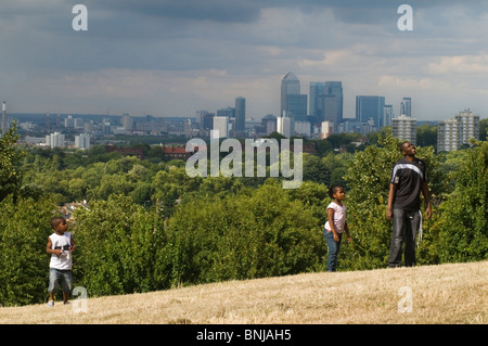 Black British children playing together in the street Portobello road ...