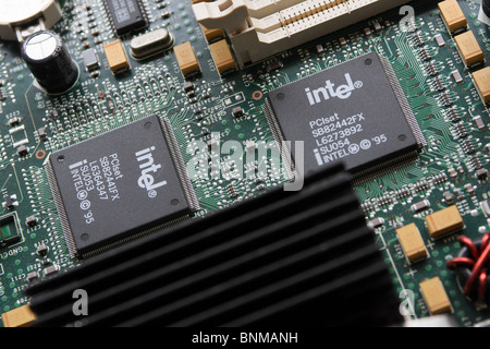 Computer PCB with two Intel PCI CPU control chips surface mounted on ...