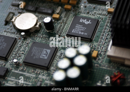 Computer PCB with two Intel PCI CPU control chips surface mounted on ...