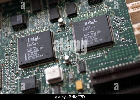 Computer PCB with two Intel PCI CPU control chips surface mounted on ...
