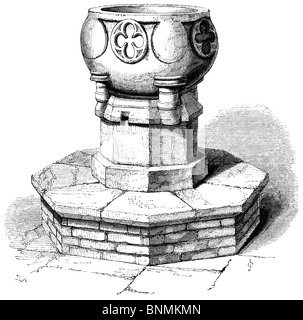 Early English stone baptismal fonts, period norman Stock Photo - Alamy