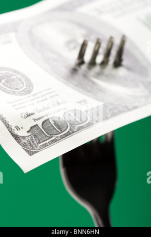 Fork over the money Stock Photo - Alamy