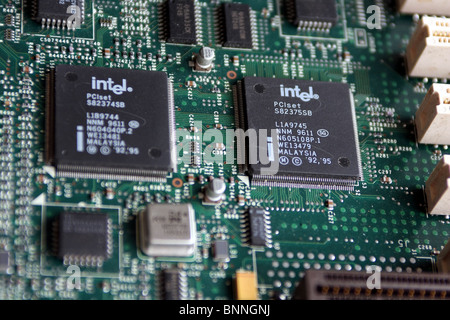 Two Intel PCI CPU controllers on a Dell computer system board Stock ...