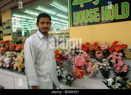 Dubai UAE Young Man Selling Flowers at Souk Stock Photo - Alamy