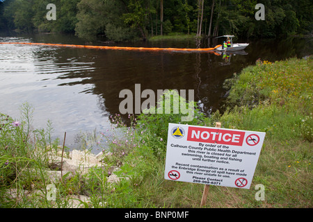 Warning sign oil spill Stock Photo - Alamy