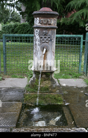 Road sign and fountain Stock Photo - Alamy