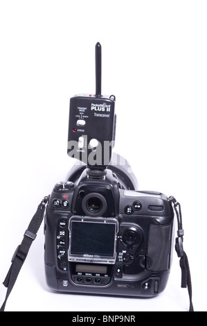 A digital camera DSLR showing a Pocket Wizard radio controlled trigger ...