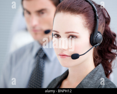 Assertive customer service representatives standing in a line Stock ...