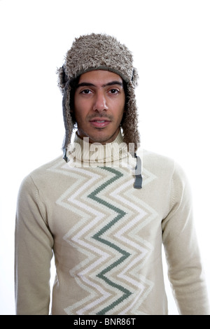 positive man in sweater and earflap on red background, fashion. Man ...