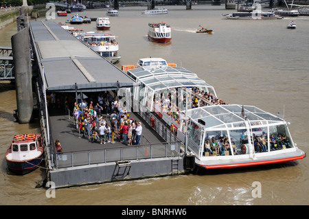 Westminster Pier with Tourist Sightseeing riverboat, London, England ...
