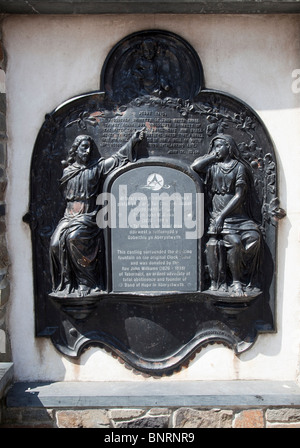 Dual English and Welsh language bilingual road sign with directions and ...