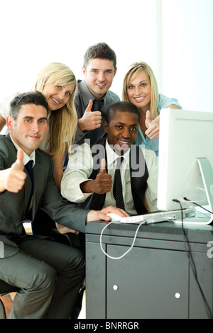 Multi ethnic business meeting thumbs up gesture happy smiling teamwork ...