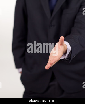 businessman showing a handshake to the camera Stock Photo - Alamy