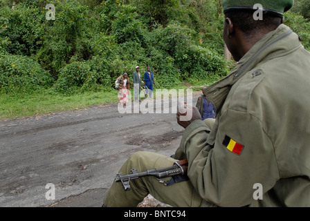 A FARDC Congolese government soldier stands guard with a Kalashnikov AK ...