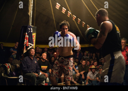 Boxers in action at Fred Brophy's boxing tent during the annual ...
