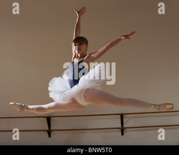Ballet jump. Young and graceful ballet dancers in black style isolated ...