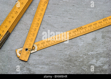 Detail of a folding wooden meter. Measuring tool for construction and ...