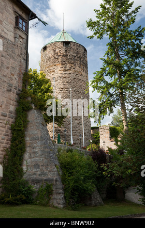 13th century Medieval Castle hotel Colmberg on hillside above quaint ...