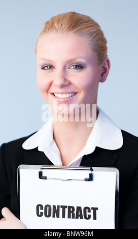 Woman holding a contract on a clipboard Stock Photo - Alamy