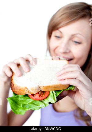 Beautiful woman holding a sandwich Stock Photo - Alamy