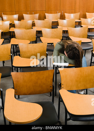 Young student sleeping in the classroom Stock Photo - Alamy