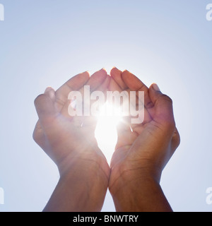 A latin woman framing with hands outdoors with urban background Stock ...