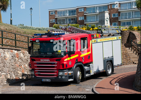 Scania fire engline driving through the streets of Hunstanton, England ...