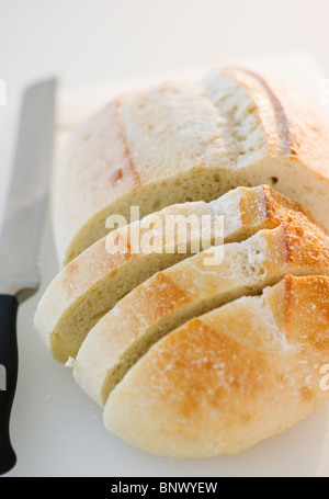 Vertical shot of a cut loaf of white bread Stock Photo - Alamy