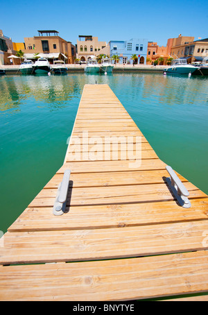 Small private wooden jetty in a tropical marina Stock Photo - Alamy