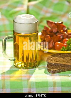 Traditional yellow mustard beer mug jar Stock Photo - Alamy
