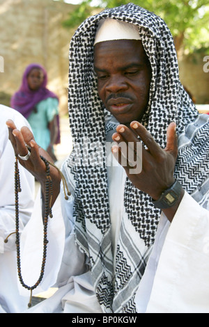 A Muslim man prays in Chad Africa Stock Photo - Alamy