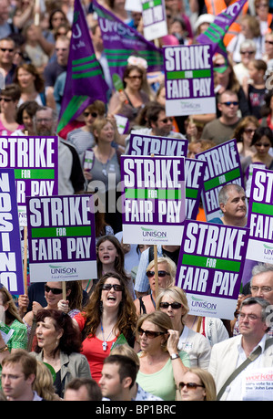 Striking local government workers march in London. Man in 'Picket' t ...