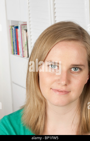 Young beautiful blonde and blue eyes woman wearing blue t-shirt over ...