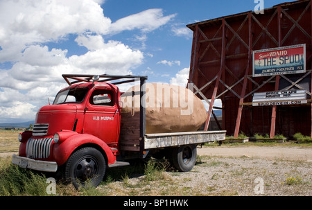 A giant potato on a flatbed truck stands outside the Spud Drive-In ...