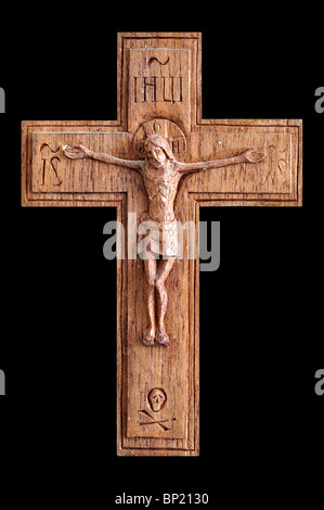 Christ on the cross, a skull and bones at its foot. On the left ...