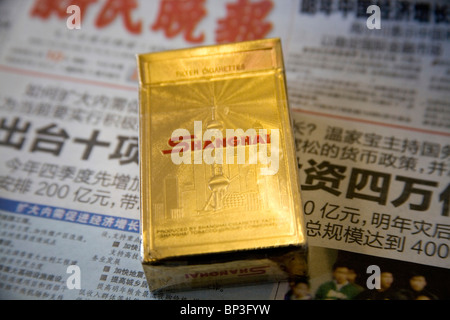 Gold embossed pack of Shanghai cigarettes featuring futurist Pudong ...
