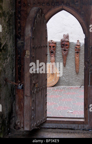 Carved wooden masks in the souks of Essaouira, Morocco Stock Photo - Alamy