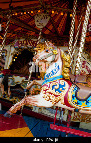 Old fashioned steam-powered carousel in operation at Beamish Open Air ...