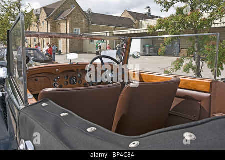 Interior of an old British Classic car focusing on the interior dials ...