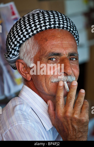 A man smoking, Kurdistan Stock Photo - Alamy
