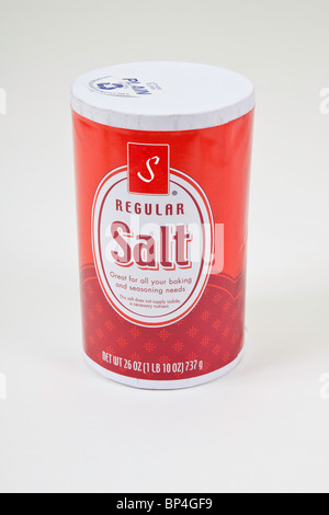 Table salt. Tub of natural table salt (sodium chloride) for cooking ...