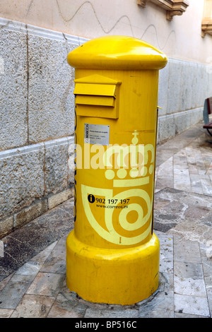 yellow spanish mailbox Stock Photo - Alamy